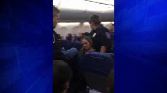 Woman escorted off Vegas-bound MIA flight after allegedly attacking ...