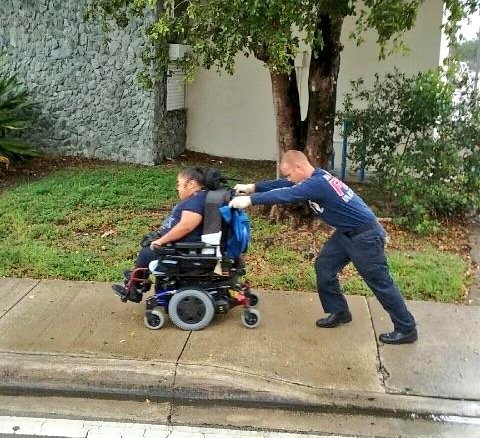 Fire rescue crew helps woman in electric wheelchair in rain – WSVN ...