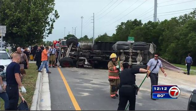 Dump truck spills debris onto Cow Key Channel bridge - WSVN 7News ...