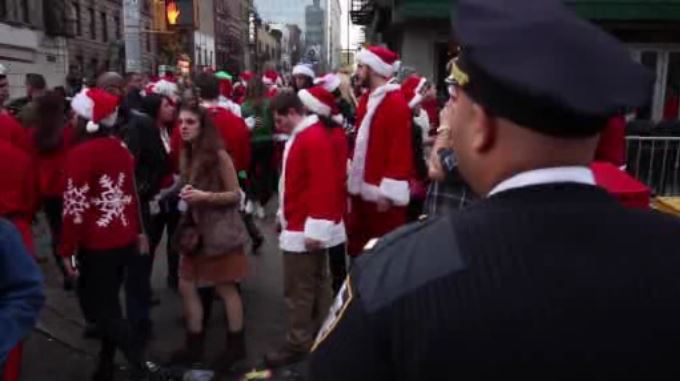 Red-suited SantaCon pub crawl revelers fan out across NYC - WSVN 7News ...