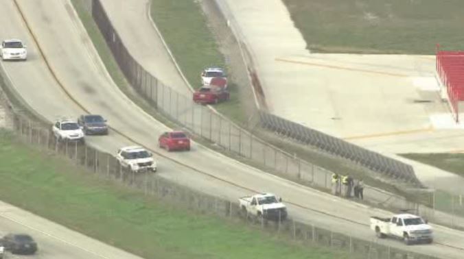 Car crashes through FLL gate causing security breach - WSVN 7News ...
