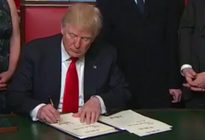 Trump signs first bill and actions as president; LGBTQ, climate ...