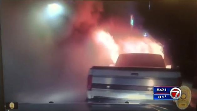Texas policeman used his car to push away burning pickup - WSVN 7News ...
