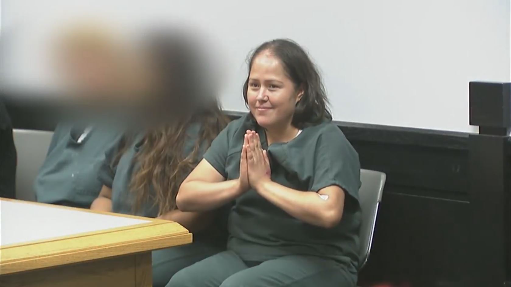 Woman charged with killing family smiles in court - WSVN 7News | Miami ...