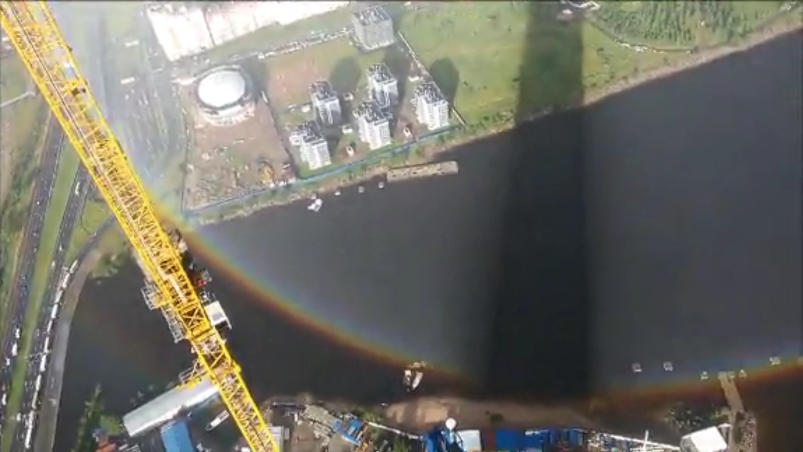 Worker on Russian skyscraper captures stunning full-circle rainbow ...