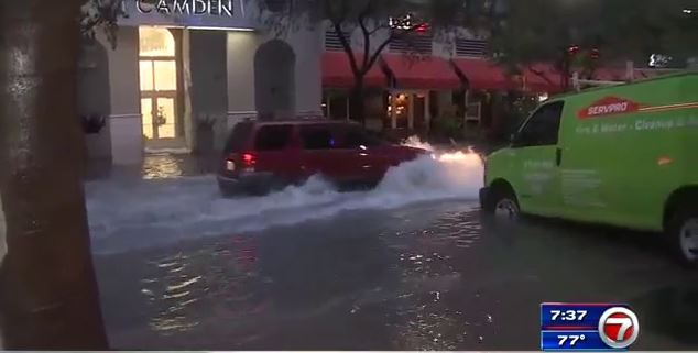 Torrential rain floods businesses, homes in Miami Beach, Brickell ...