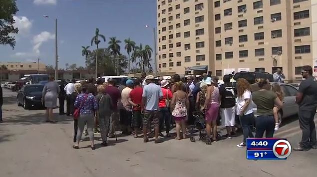 Families displaced outside apartment building get Miami mayor’s ...