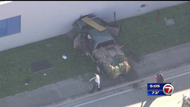 Driver hospitalized after slamming into MDC North building - WSVN 7News ...