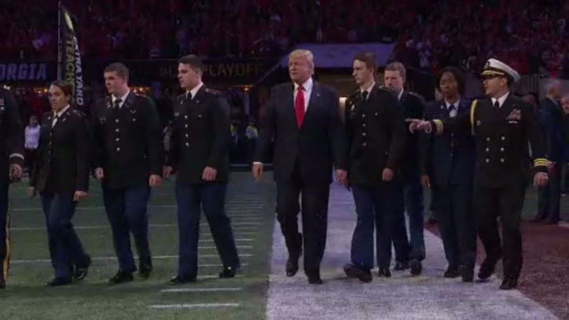 Trump takes field at college football championship game - WSVN 7News ...