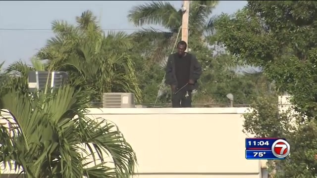 Baton-wielding man in custody after Miami rooftop standoff - WSVN 7News ...
