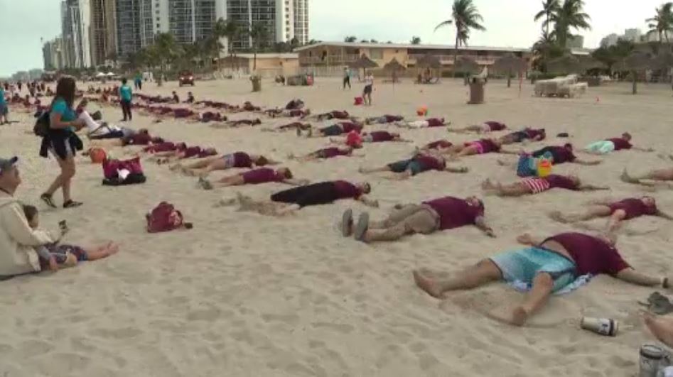 Local attempt to set Guinness record for most sand angels falls short ...