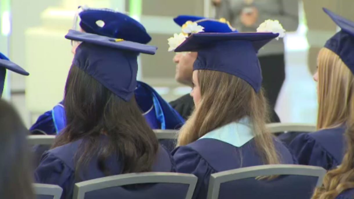 Out-of-state FAU graduates celebrate hard work at make-up commencement ...