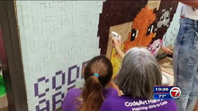 Volunteers paint pixelated-style mural created by teen coder - WSVN ...