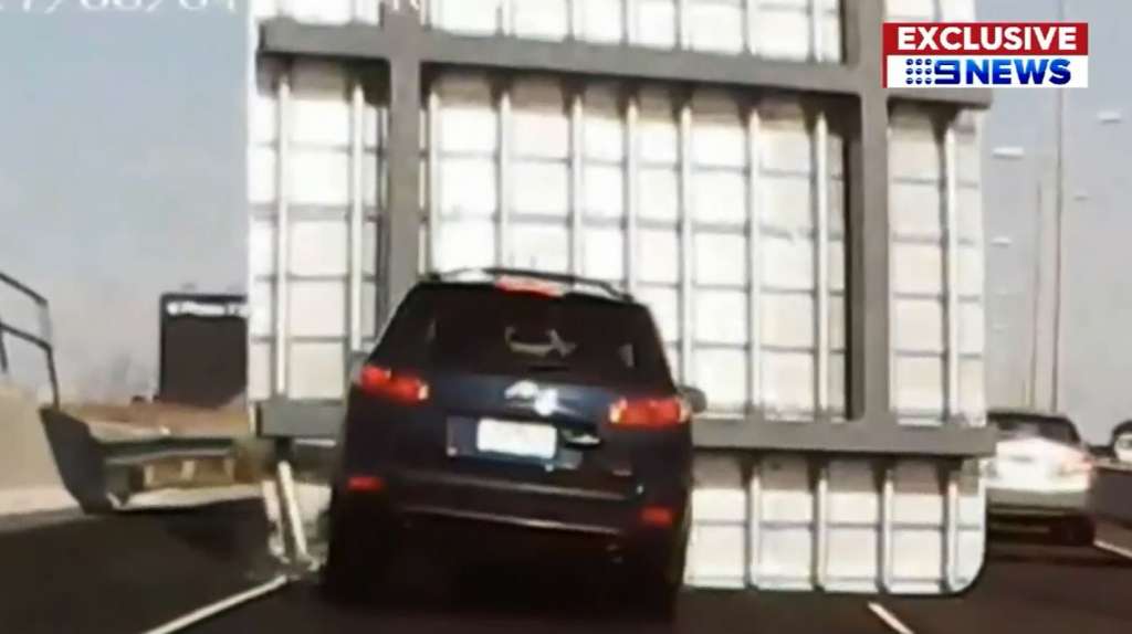 Dashcam captures sign crushing car on Australia freeway – WSVN 7News ... Dashcam captures sign crushing car on Australia freeway – WSVN 7News ...