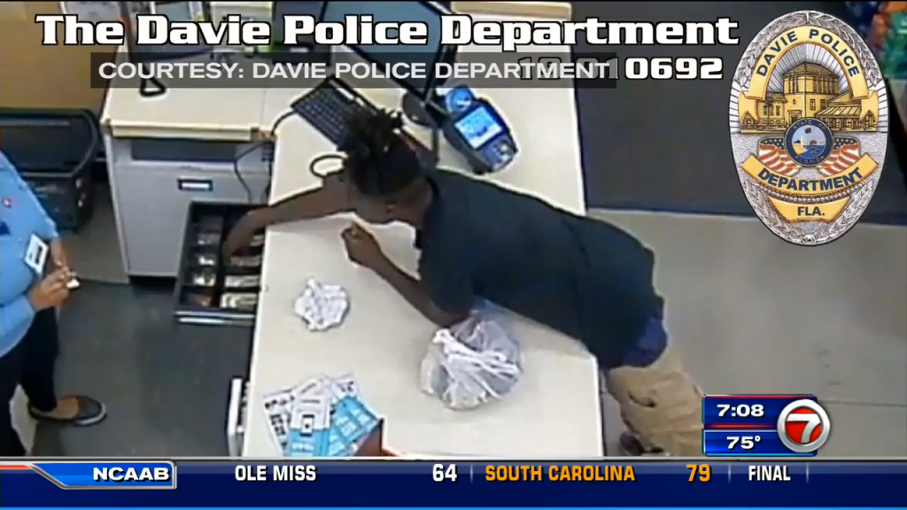 Surveillance video shows man snatching money out of Walgreens register ...