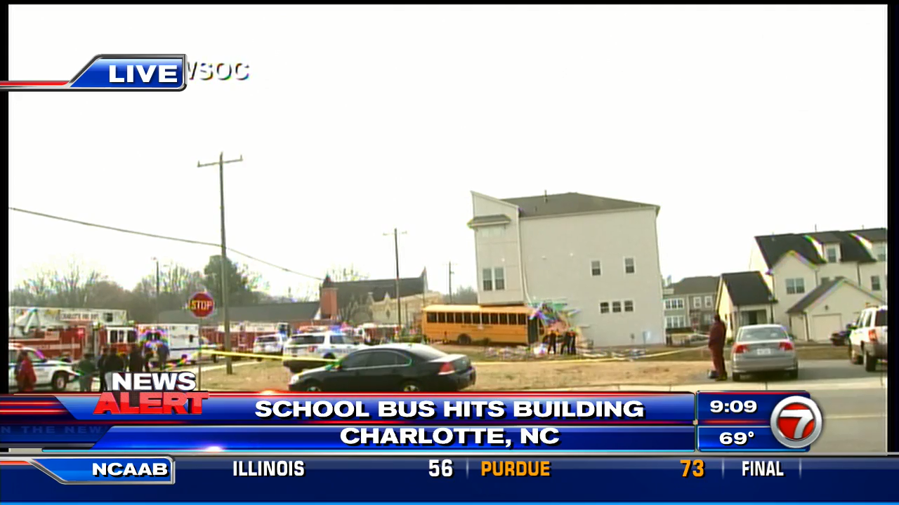 School bus transporting children crashes into building in North ...
