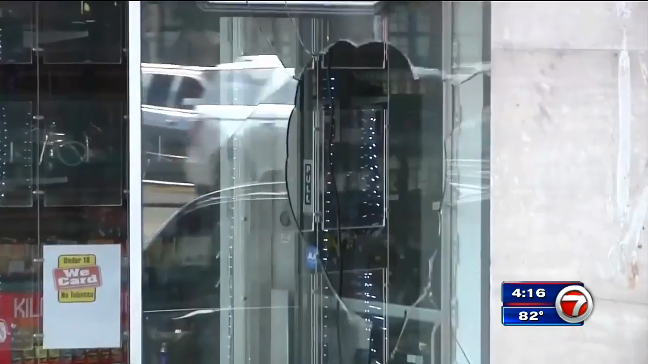 Vandal throws cinder block through window of Miami Beach store - WSVN ...
