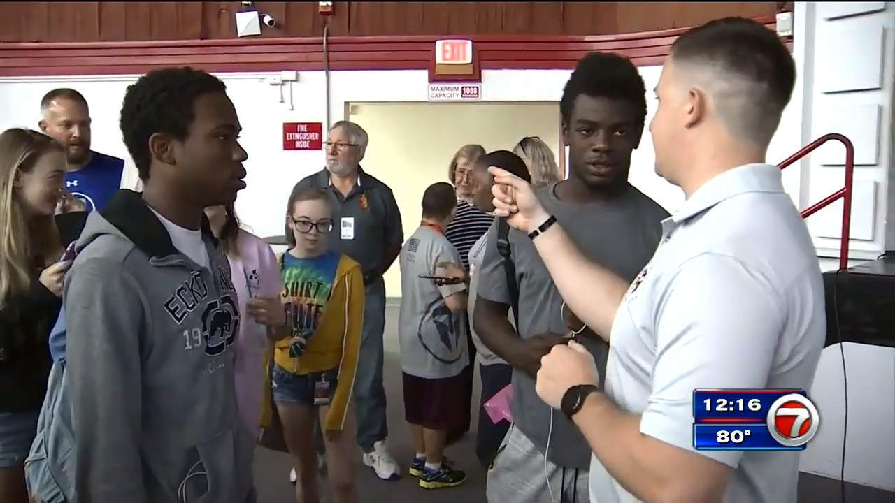 Son of MSD shooting victim honors father at South Broward High School ...