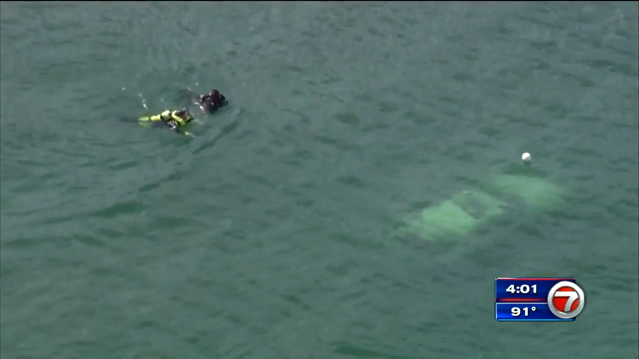 Woman dies after being pulled from car submerged off Bay Harbor Islands ...