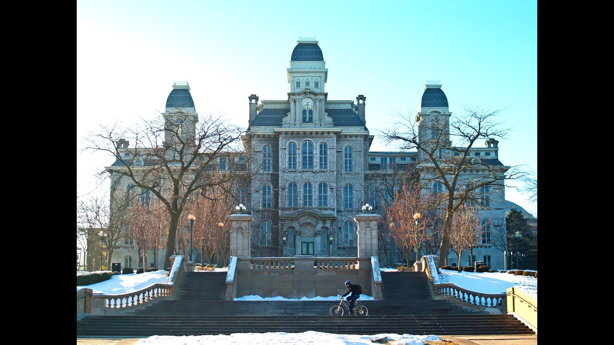 Syracuse University students protest after three racist graffiti ...