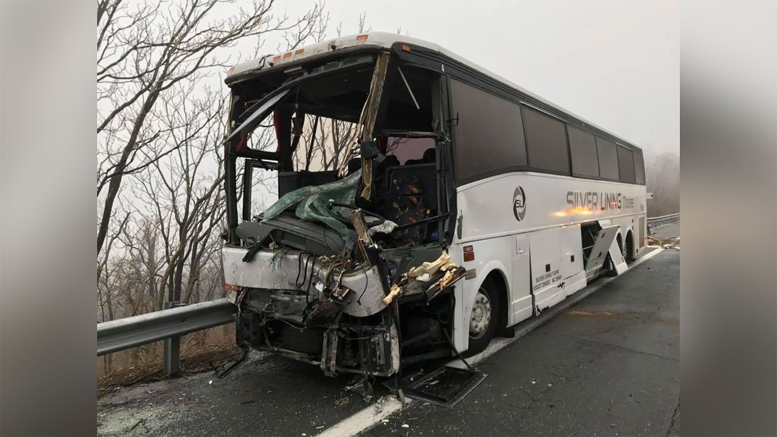 A bus crashes into a semi truck, splitting it in half and leaving 19 ...