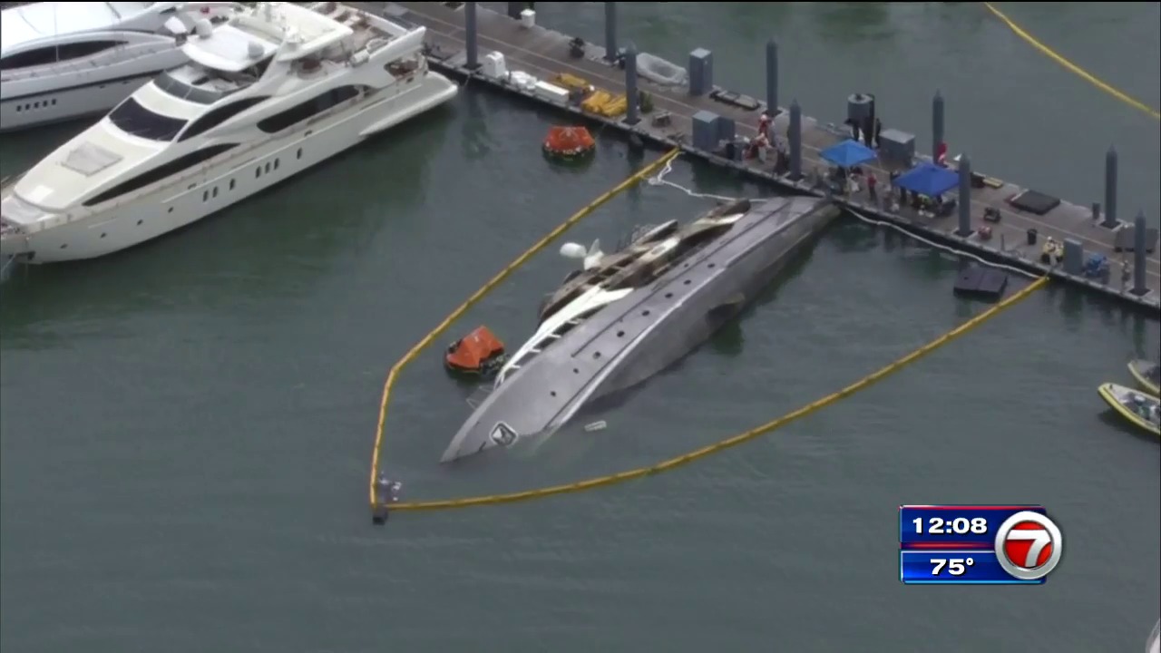 USCG crews work to contain pollution from capsized yacht in Watson ...