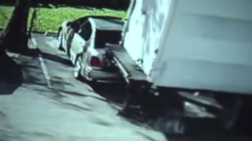 Woman demands answers after moving truck driver hits parked car, flees ...