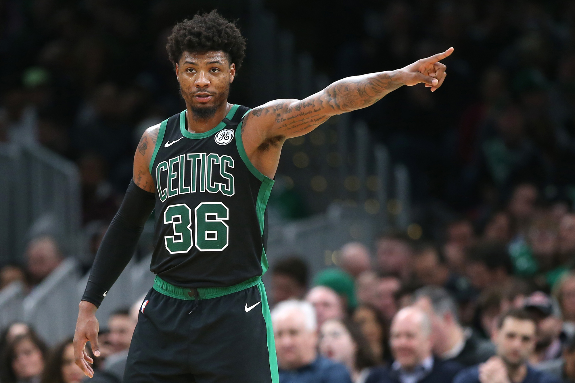 Boston Celtics’ Marcus Smart and two Los Angeles Lakers players test ...