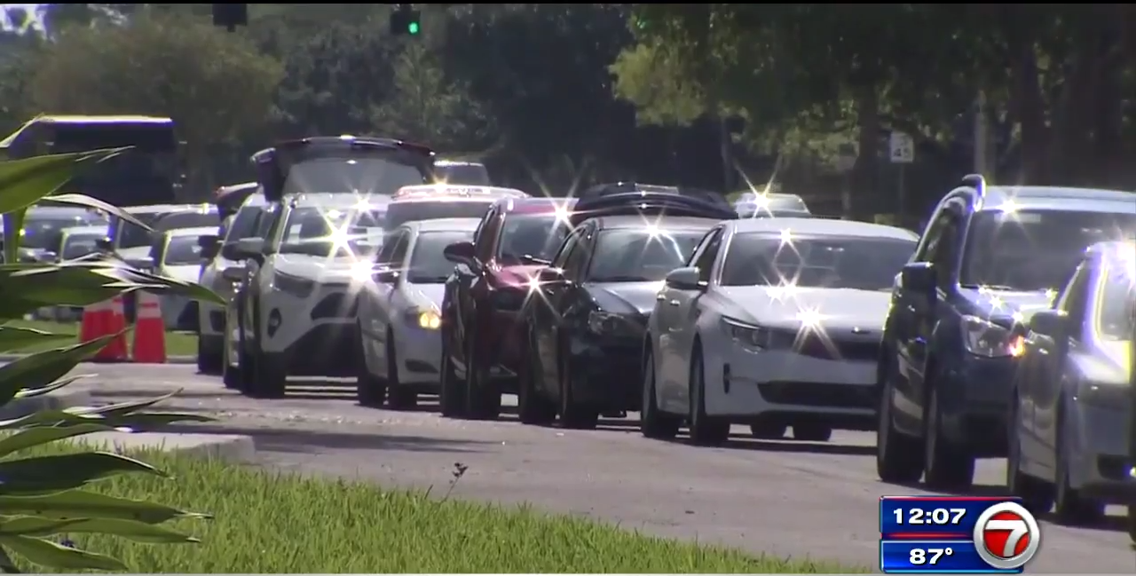 Thousands receive groceries at drive-thru food distributions across ...