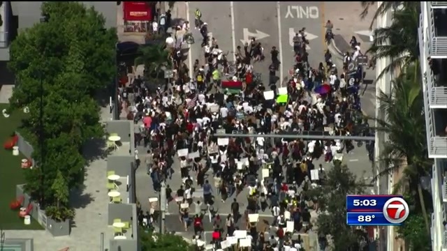 Tense confrontations between protesters and police follow peaceful ...