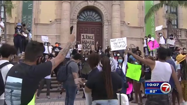 Hundreds march in Downtown Miami as business owners targeted by looters ...