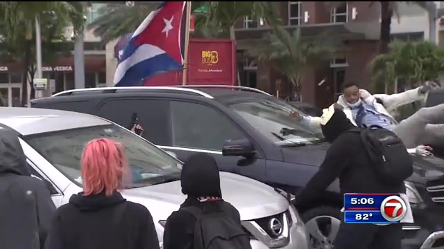 Protester OK after being hit by SUV in pro-Trump caravan during rally ...