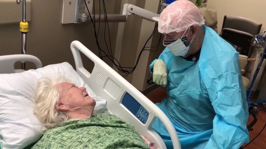 90-year-old Florida man wears full PPE to say final goodbye to wife ...
