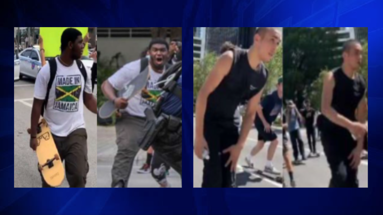 Police search for 2 men accused of assaulting officers in downtown ...