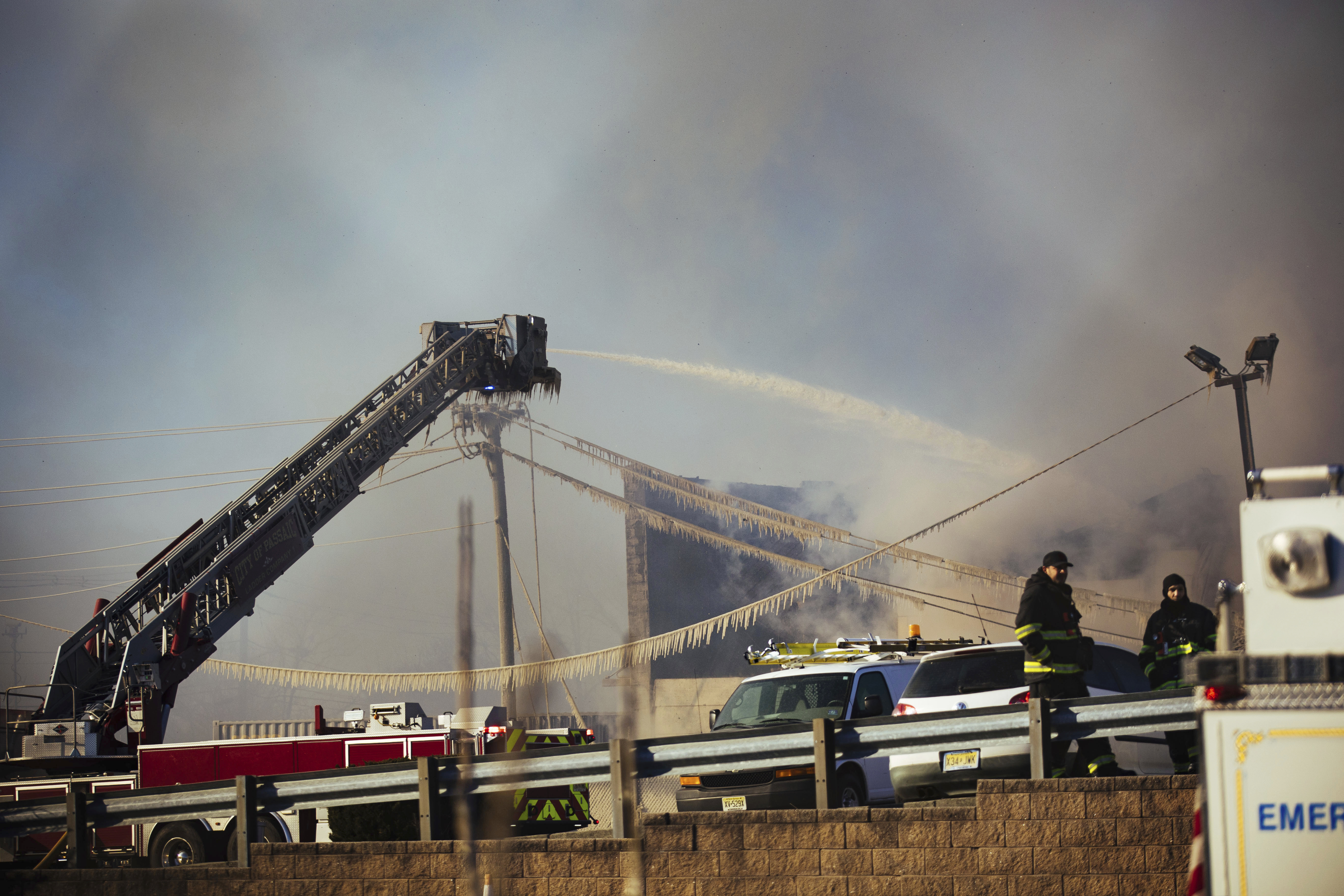 Crews battle flames, cold, wind in huge recycling plant fire - WSVN ...