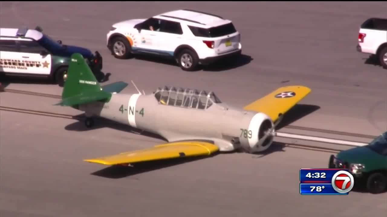 WWII fighter plane replica damaged after landing gear fails at Pompano ...