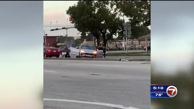 Video shows officers detaining 2 after North Miami hit-and-run, NW ...