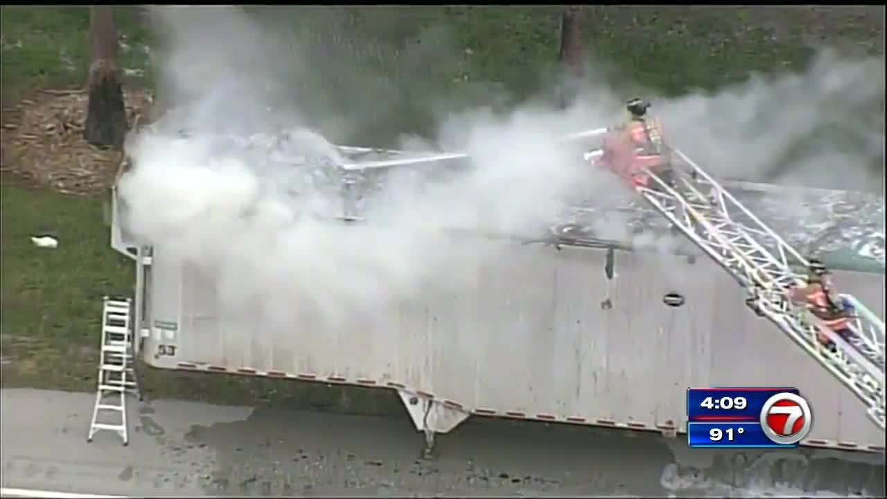 Firefighters extinguish flames on big rig in Sunrise - WSVN 7News ...