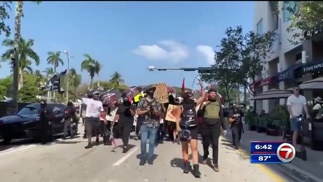 Demonstrators march in downtown Miami to protest Daunte Wright shooting ...