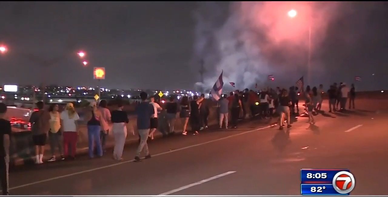Demonstrators walk onto Palmetto Expressway in Hialeah for 2nd ...