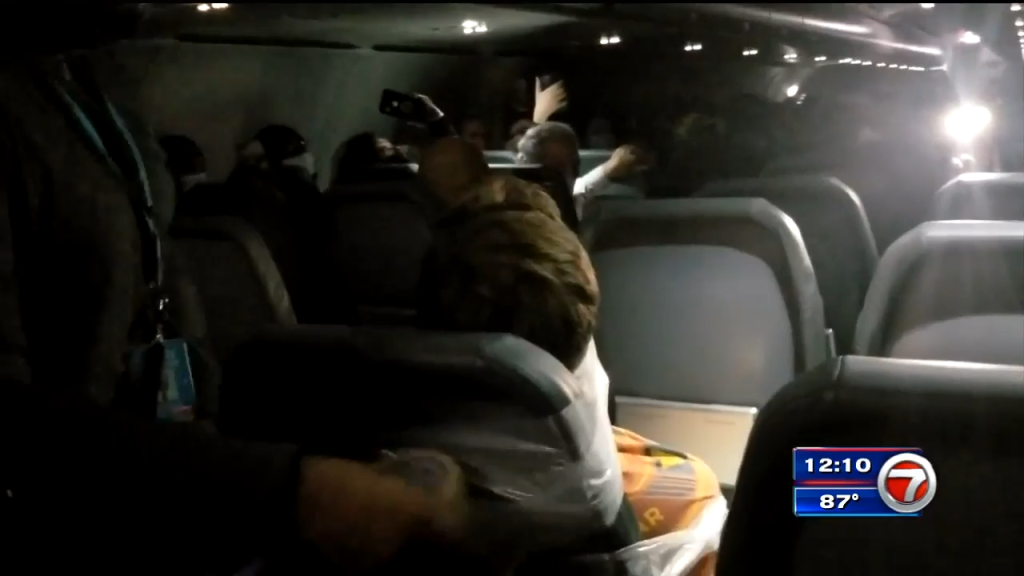 Police: Unruly passenger restrained to seat after groping flight ...