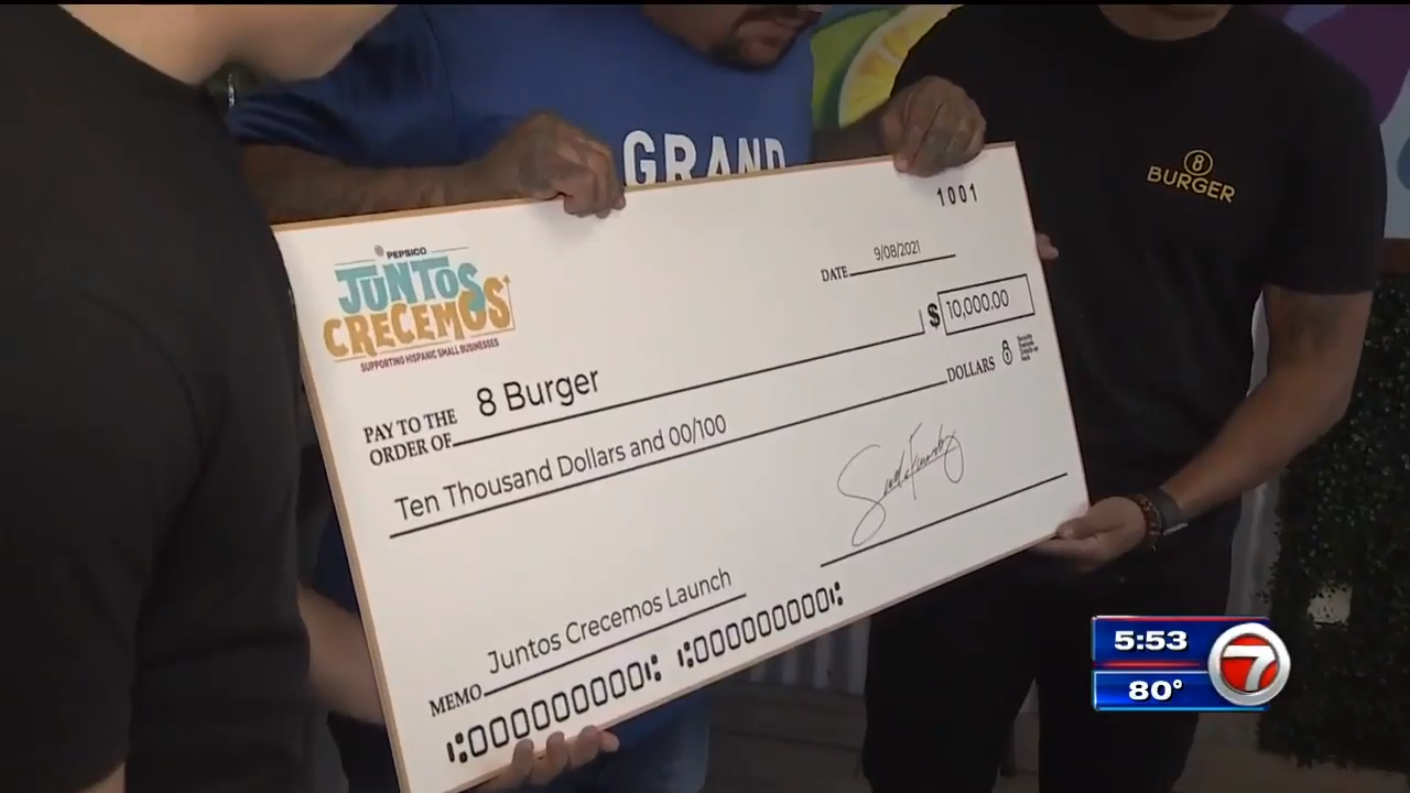 Chef Aaron Sanchez gives $10,000 check to 8 Burger in Little Havana ...