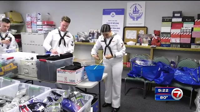 Navy officers prep gift bags for crew members of ship to be ...