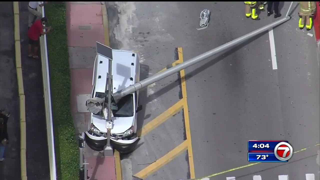 Crash leads to downed light pole in Miami Beach, traffic closed in both ...
