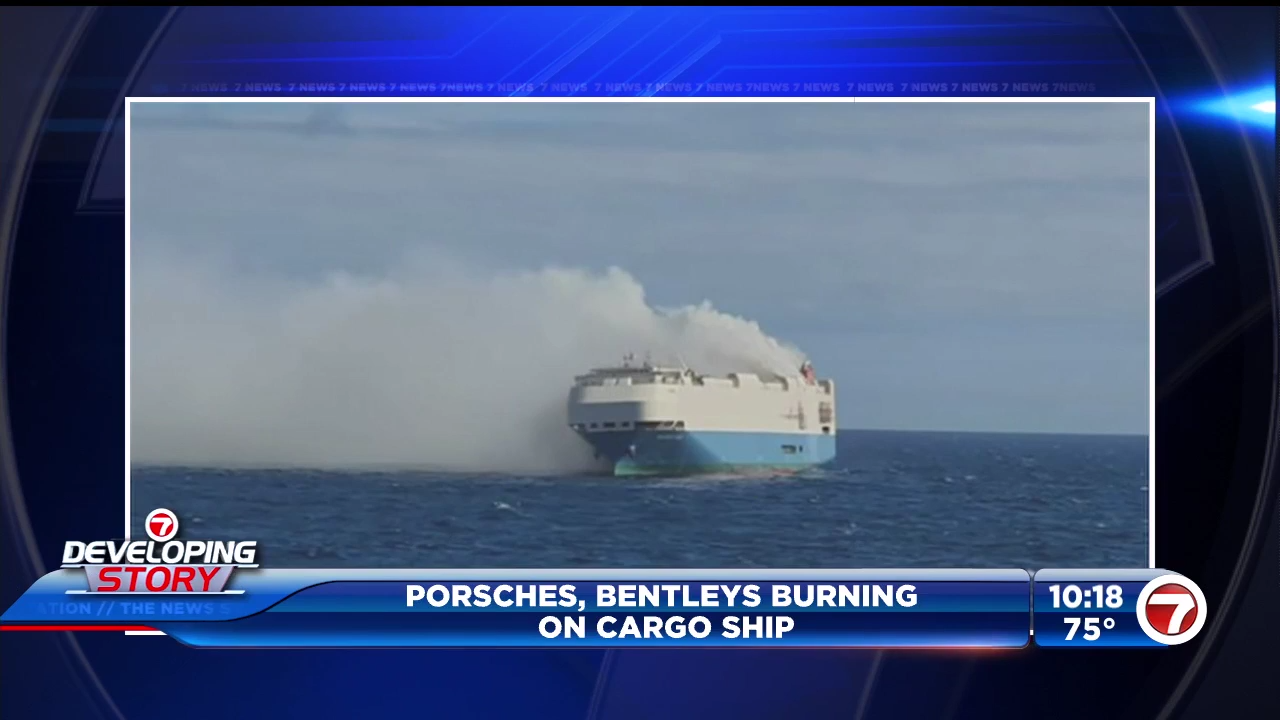 A cargo ship full of luxury cars caught on fire in the middle of the ...