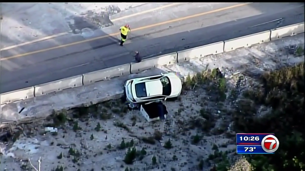 Car jumps off concrete barrier, runs off road in NW Miami-Dade - WSVN ...