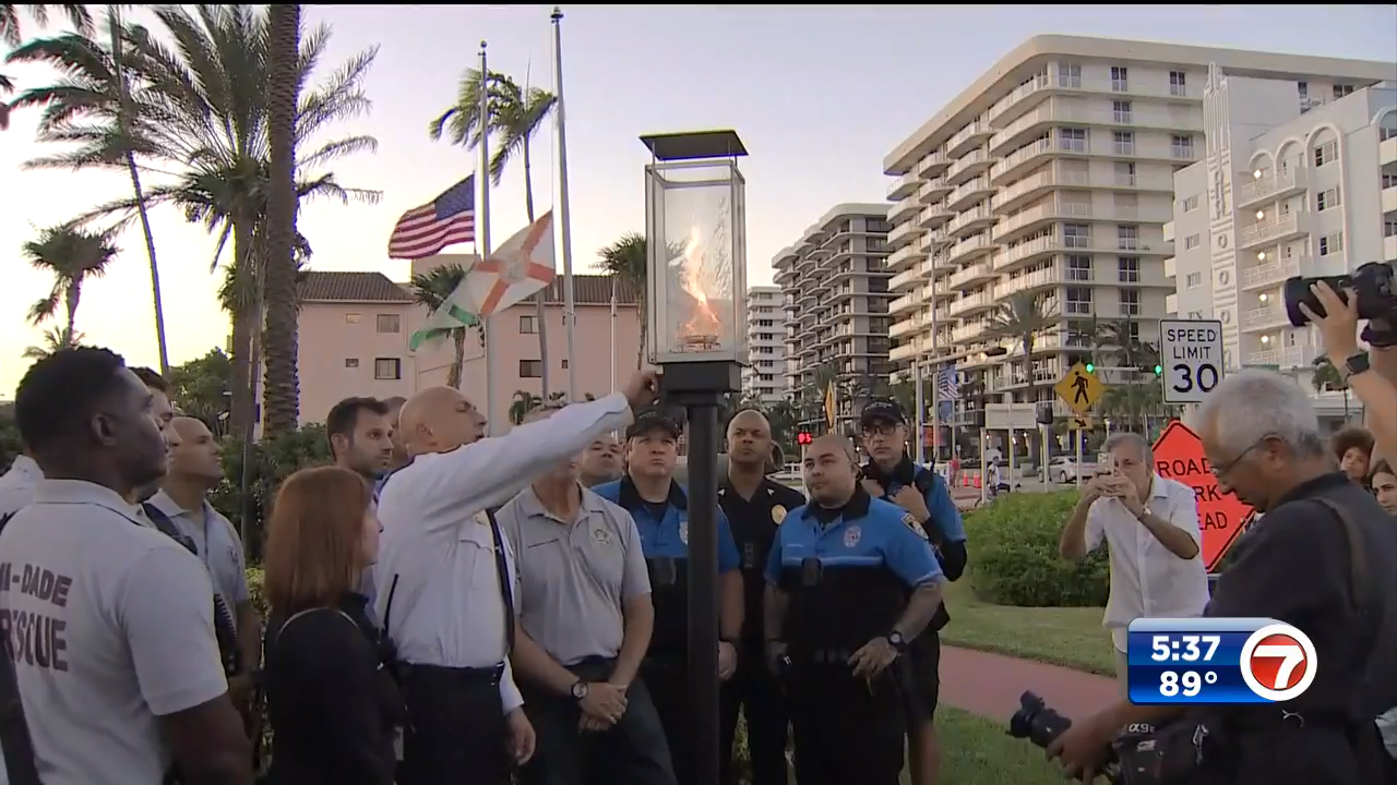 Symbolic torch extinguished in Surfside to honor 1 year since last ...