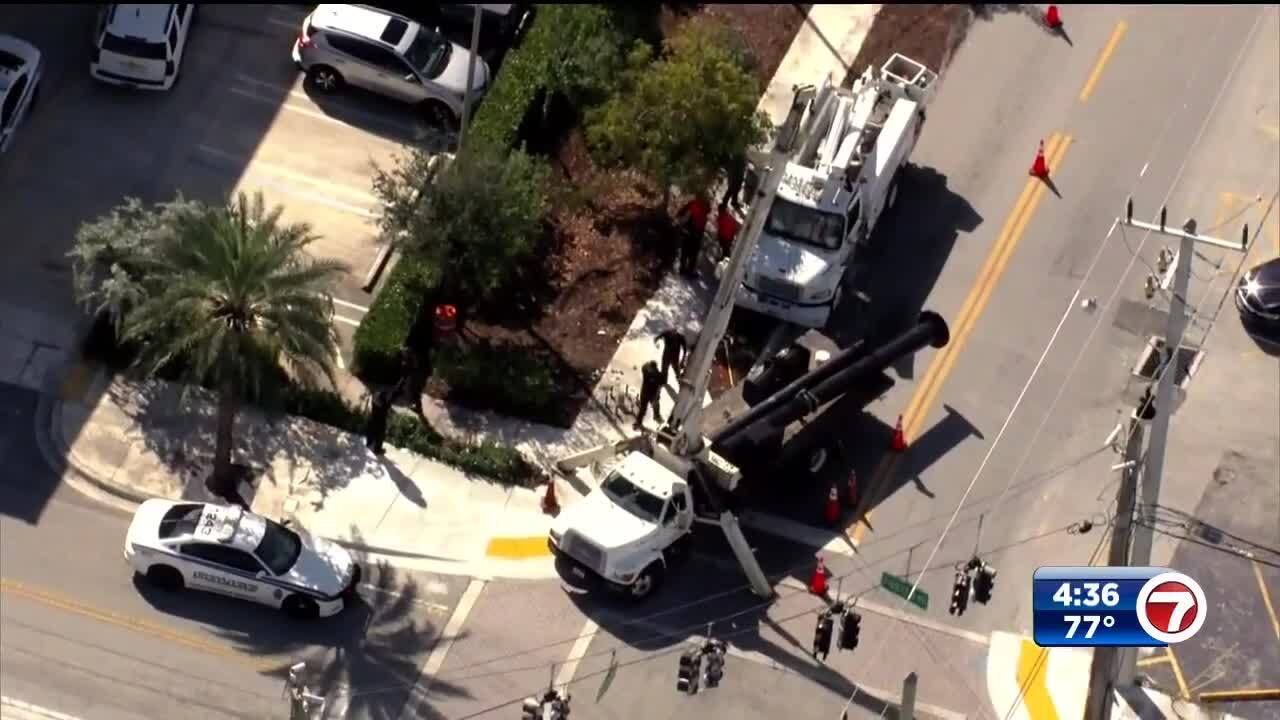 Light pole falls on construction worker in Hallandale Beach - WSVN ...