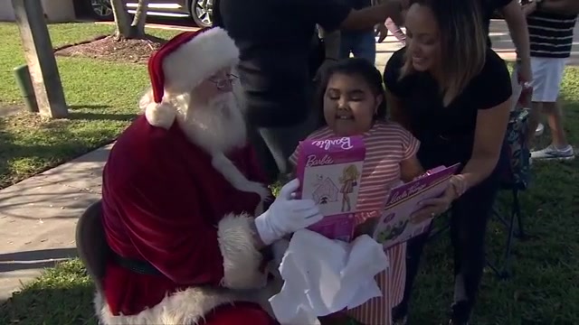 6-year-old battling cancer treated to parade, visit from Santa in ...