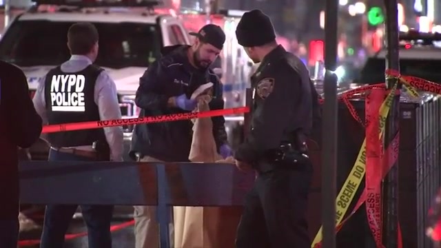 Police probe motive in machete attack on officers near Times Square ...